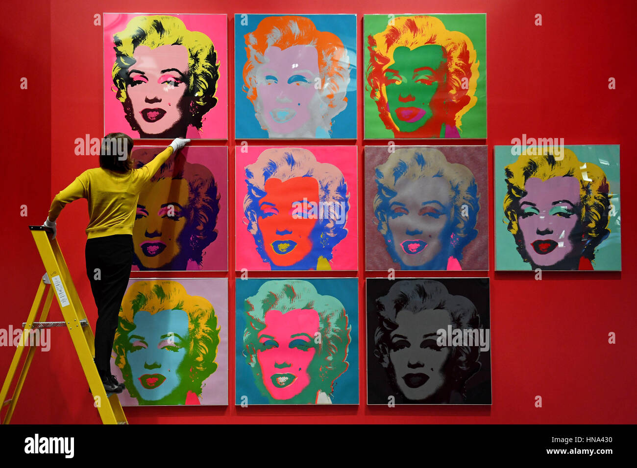 Catherine Daunt, project curator at the British Museum, adjusts one of ...