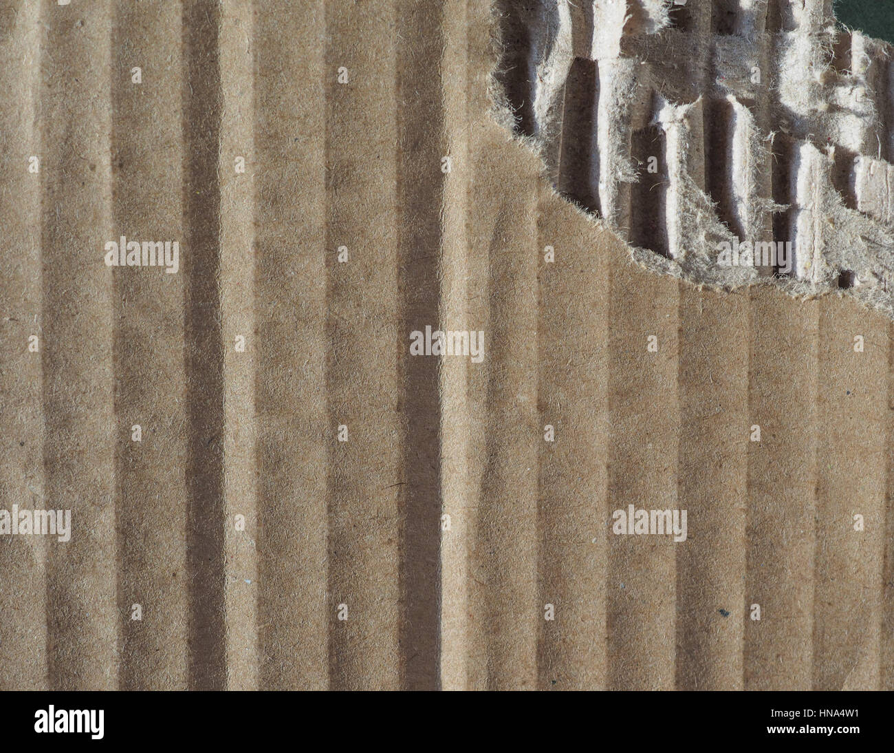 Grunge brown corrugated cardboard texture useful as a background Stock ...