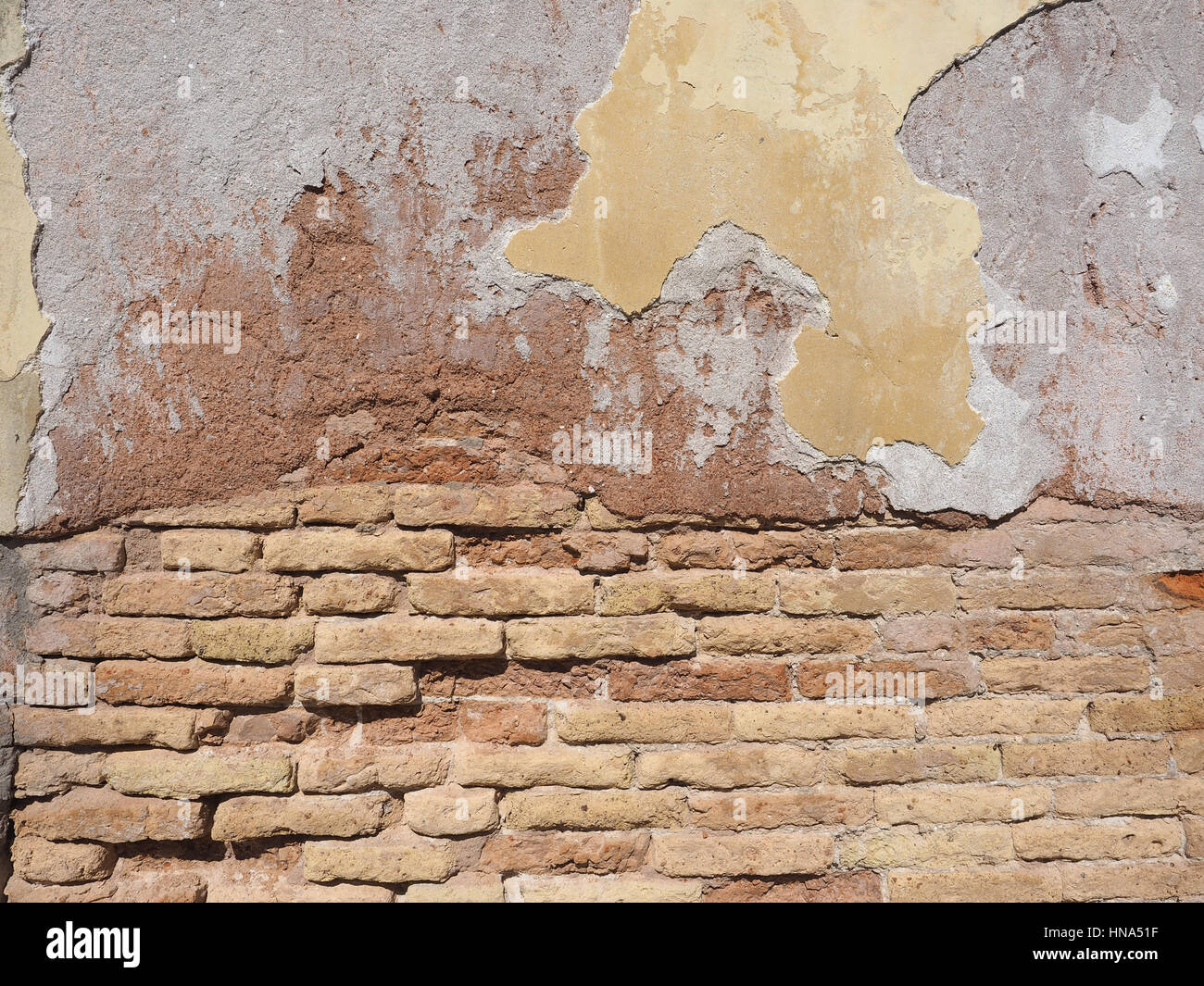 Damage caused by damp and moisture on a wall Stock Photo - Alamy