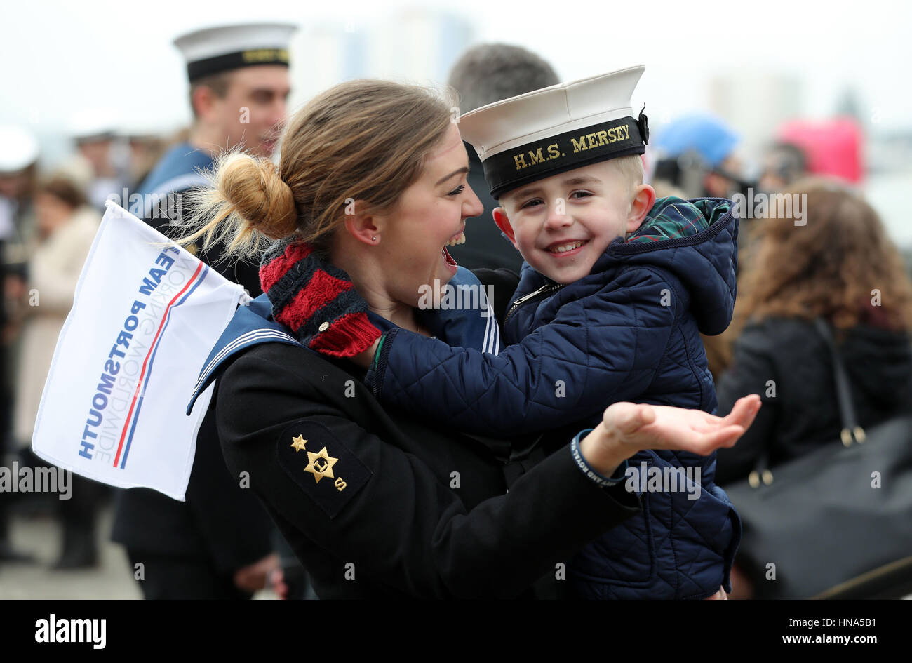Steward Amy Binns from Gosport hugs her five year old son Ethan as HMS ...