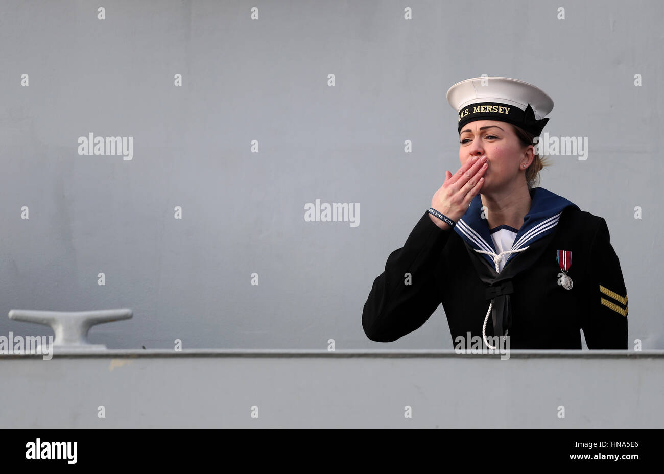 Steward Amy Binns, from Gosport, blows a kiss to her family as HMS ...
