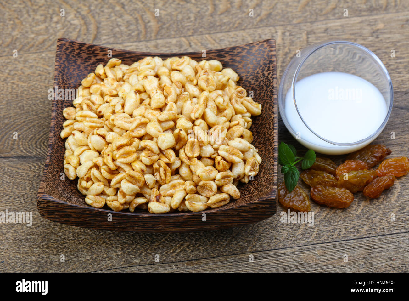 Rise flakes with milk, raisin and mint leaves Stock Photo - Alamy
