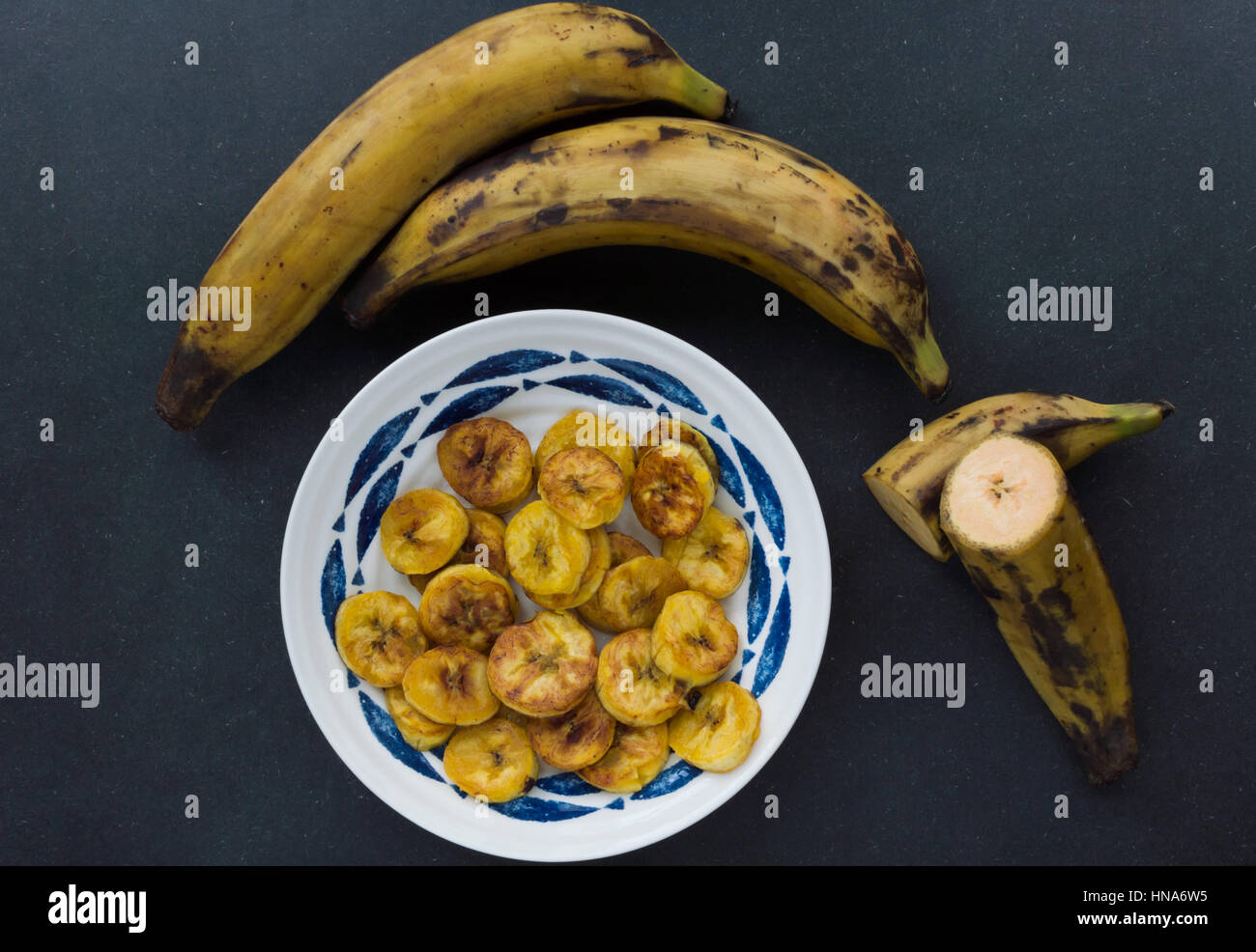 Plantain raw and fried Stock Photo - Alamy
