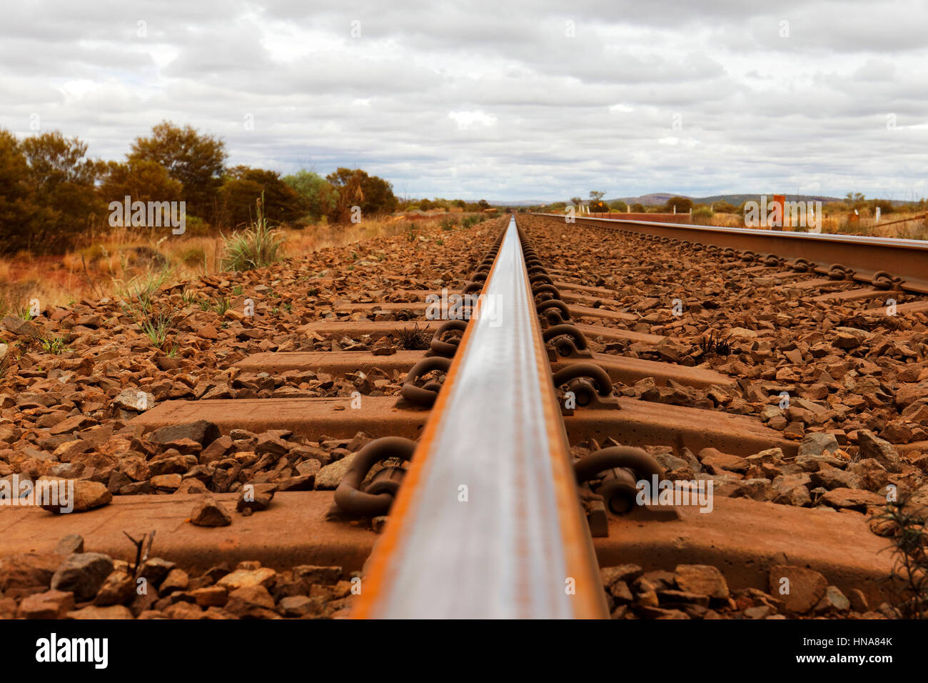 Abstract close up detail of a train rail line that carries ore trains ...
