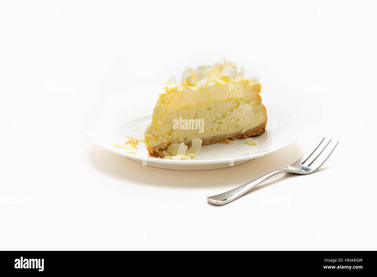 White chocolate cheese cake slice Stock Photo - Alamy