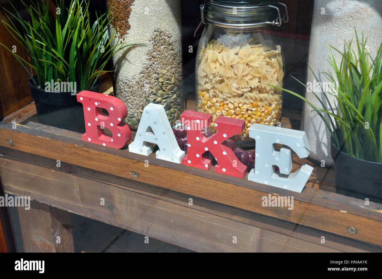 The word ’bake’ in a shop window Stock Photo - Alamy