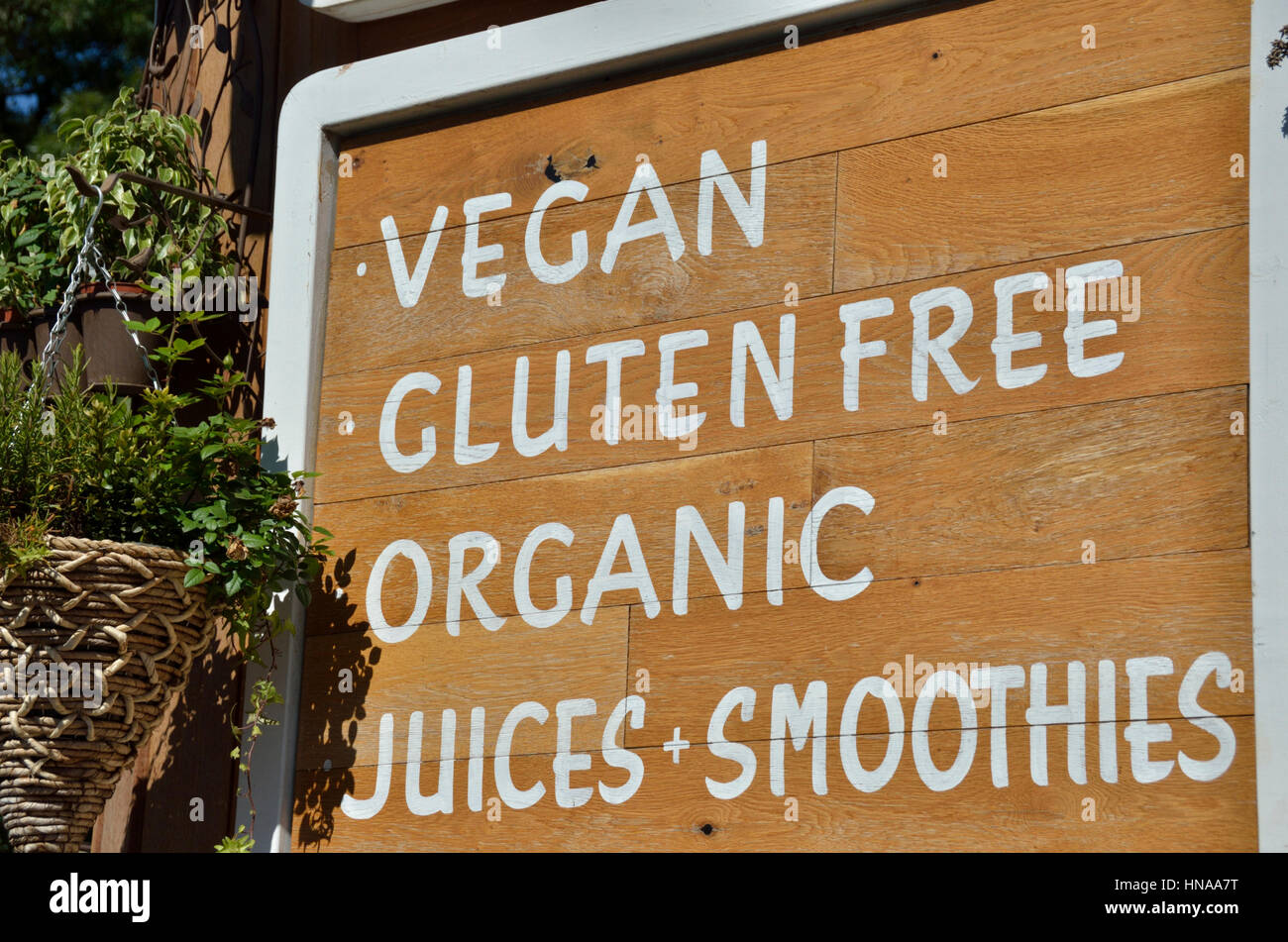 Organic vegan cafe sign Stock Photo - Alamy
