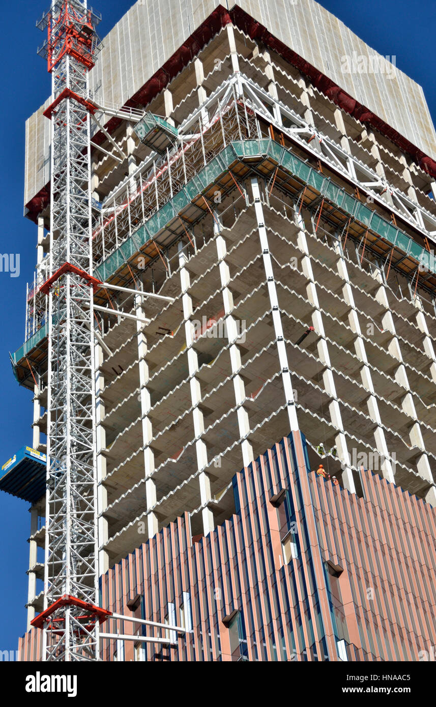 Close up of an office building tower under construction showing core ...