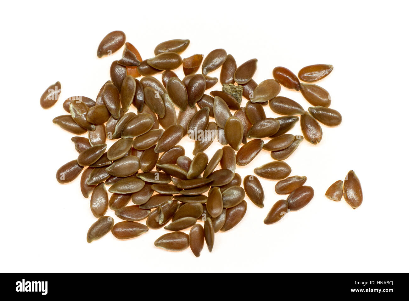 closeup of flax seeds isolated on white background Stock Photo - Alamy