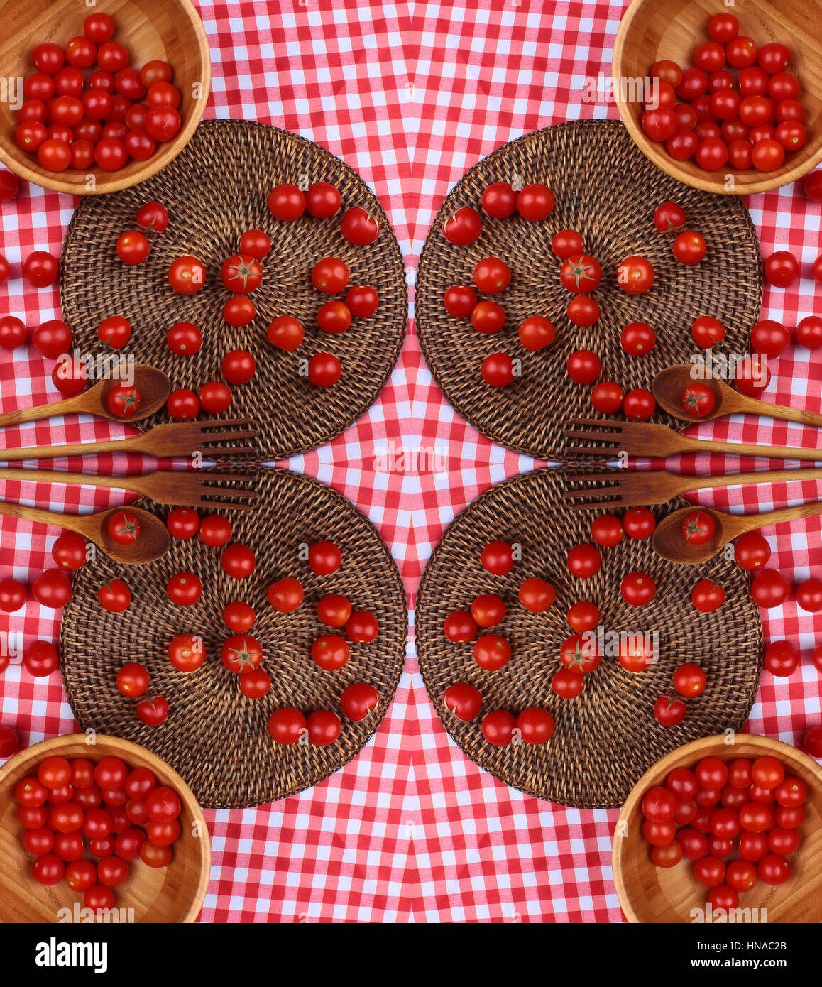 A bowl of cherry tomato & cherry tomato on a wooden background Stock ...