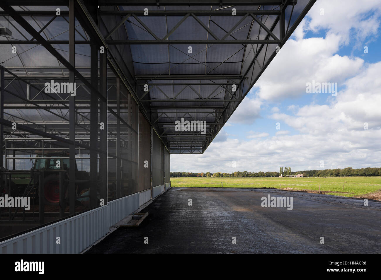 Rear of building showing landscape and internal space, doors closed ...