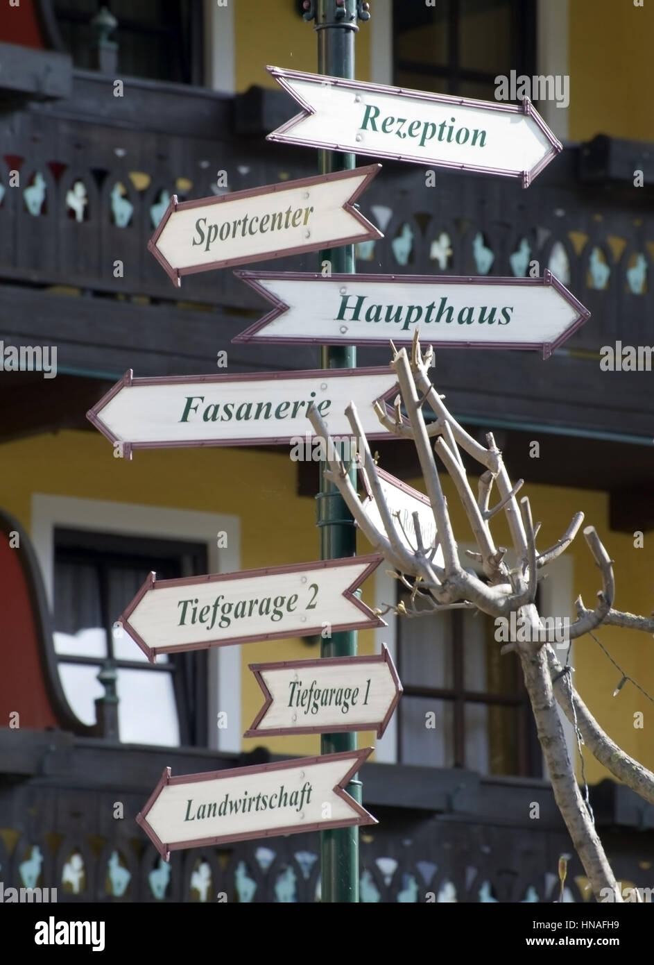 Wegweiser Hotel - direction signs Stock Photo - Alamy