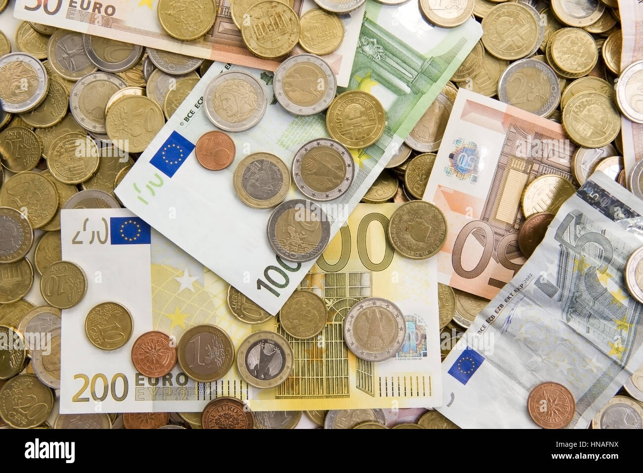 Euroscheine und Euromuenzen - euro banknotes and euro coins Stock Photo ...