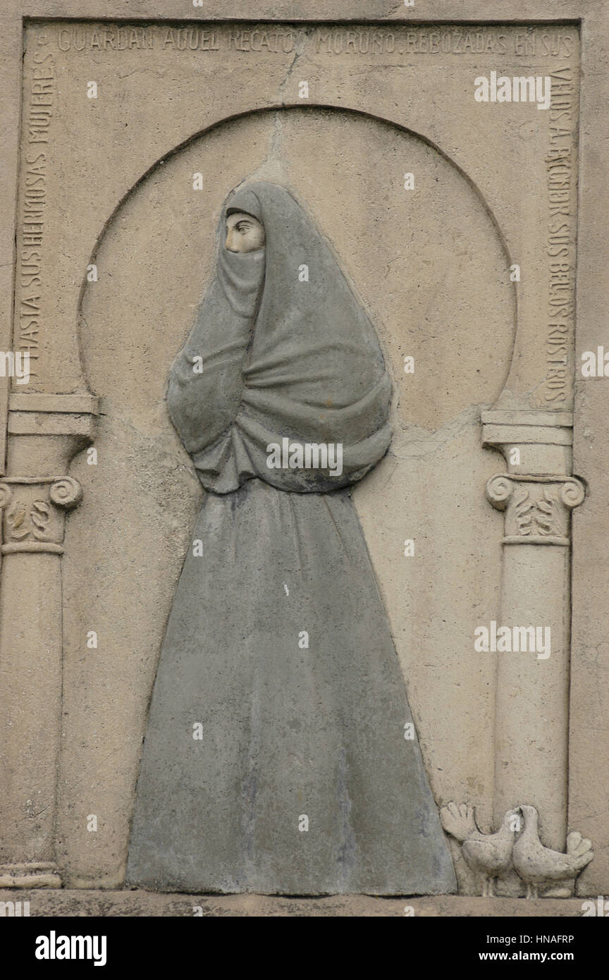 Sculpture relief portraying a muslim woman on the church entrance Stock ...