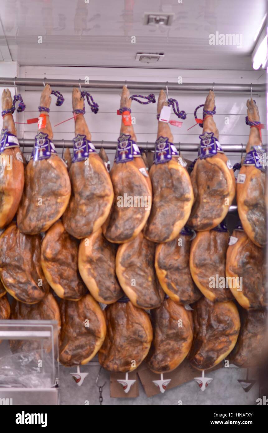 Spanish jamon serrano being sold at Valencia's Mercado Central Stock ...