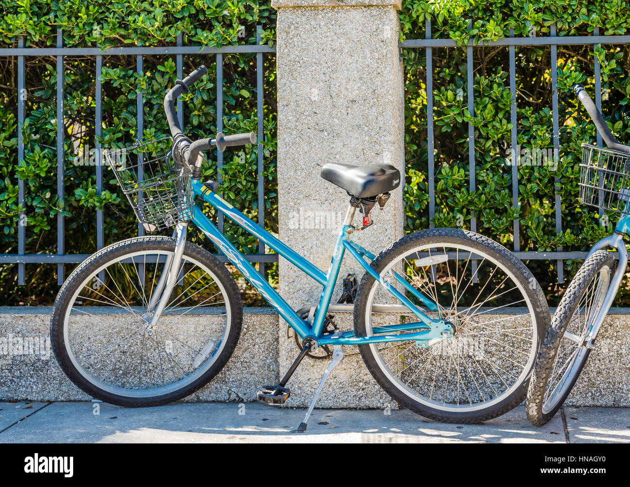 Bike against fence hi-res stock photography and images - Alamy