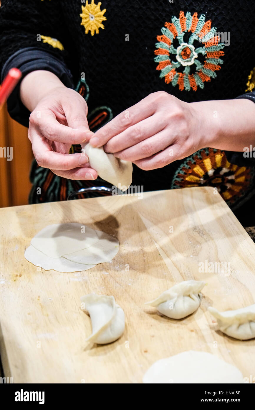 People Making Chinese Dumplings Stock Photo - Alamy