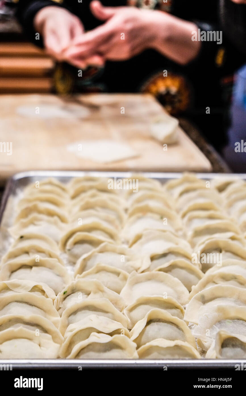 People Making Chinese Dumplings Stock Photo - Alamy
