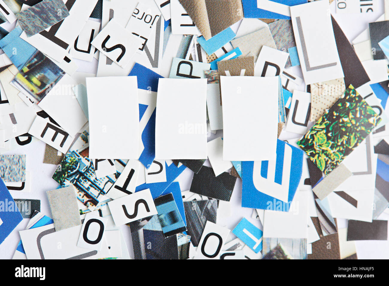 Cut out paper empty letters for word of three Stock Photo - Alamy