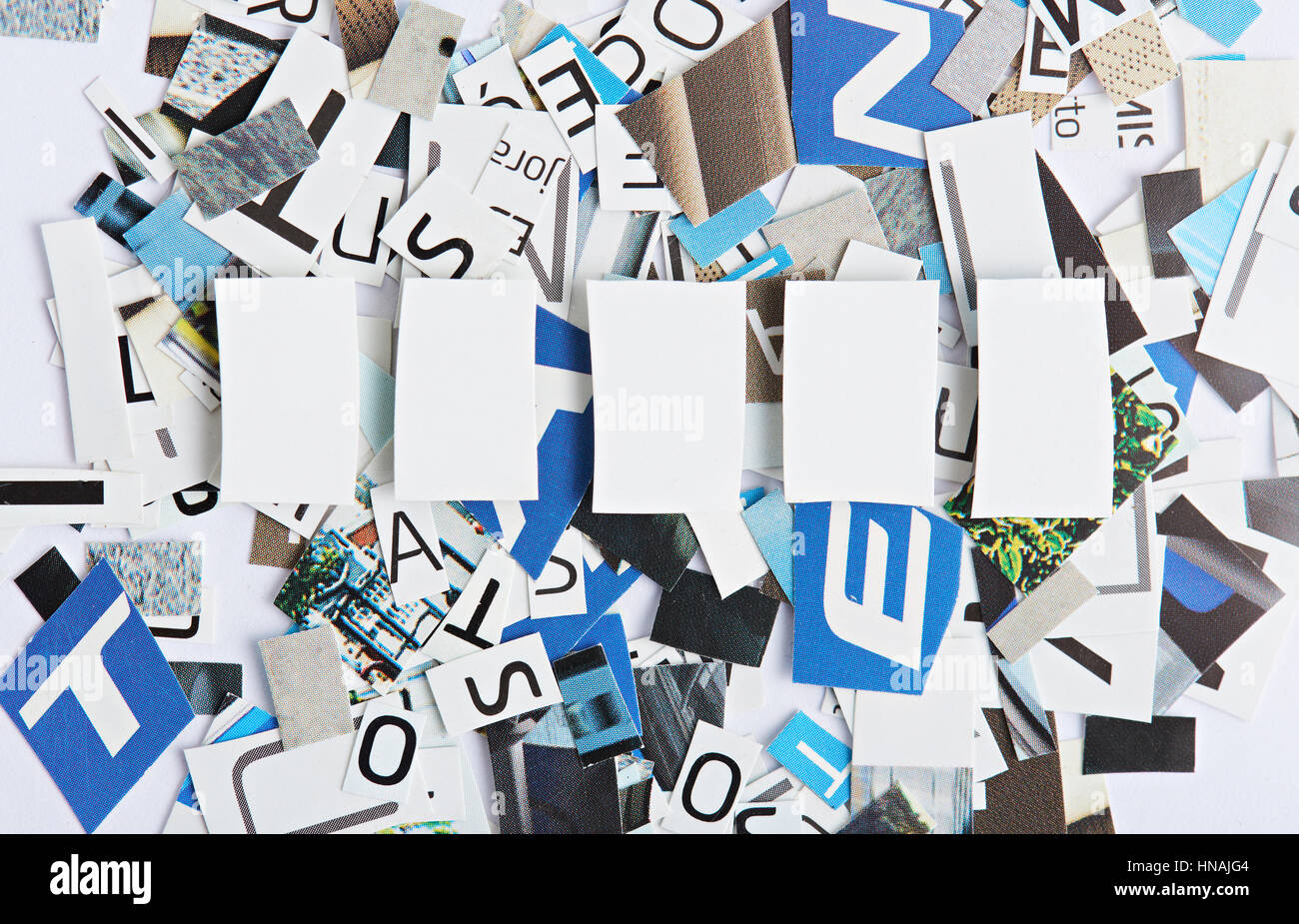 Empty letters for word cut out from magazine Stock Photo - Alamy