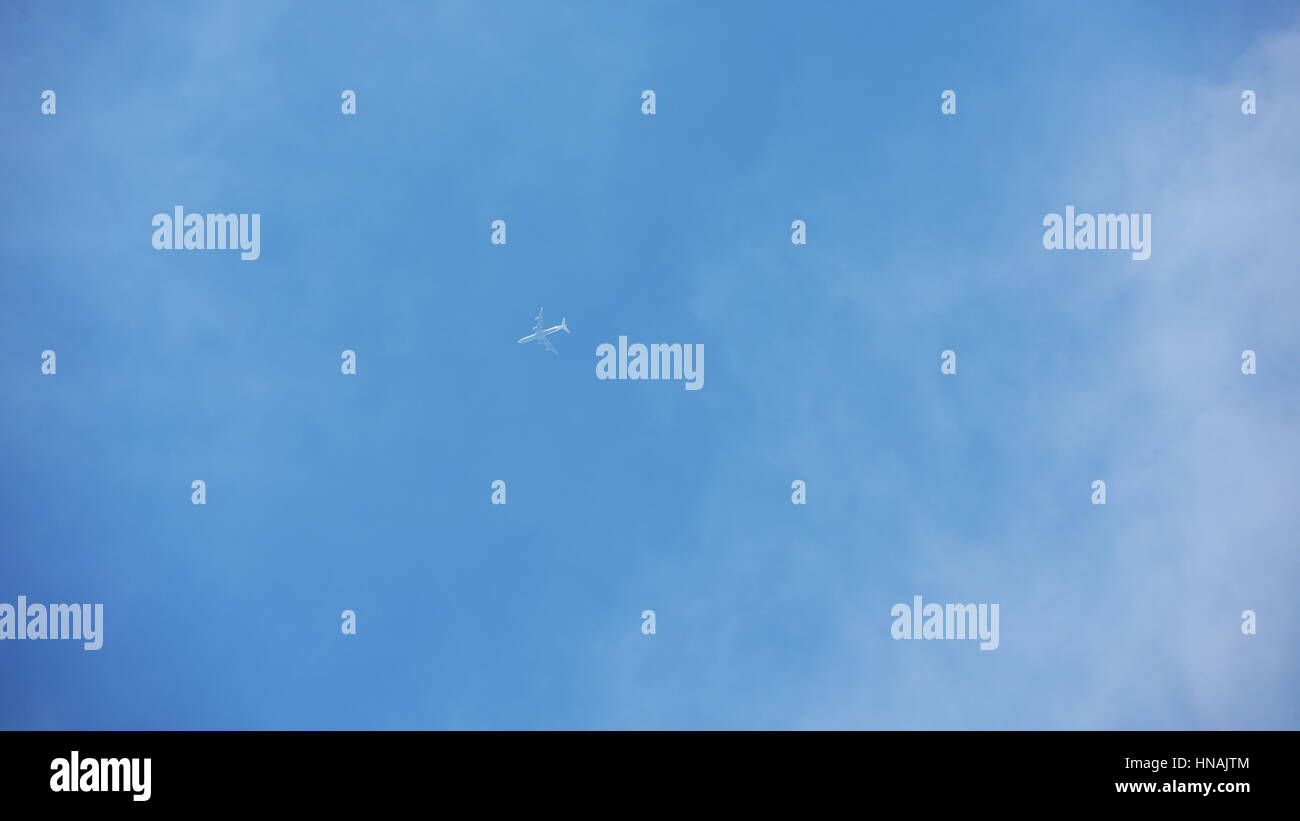 White airplane and blue sky. Upward,looking up Stock Photo - Alamy