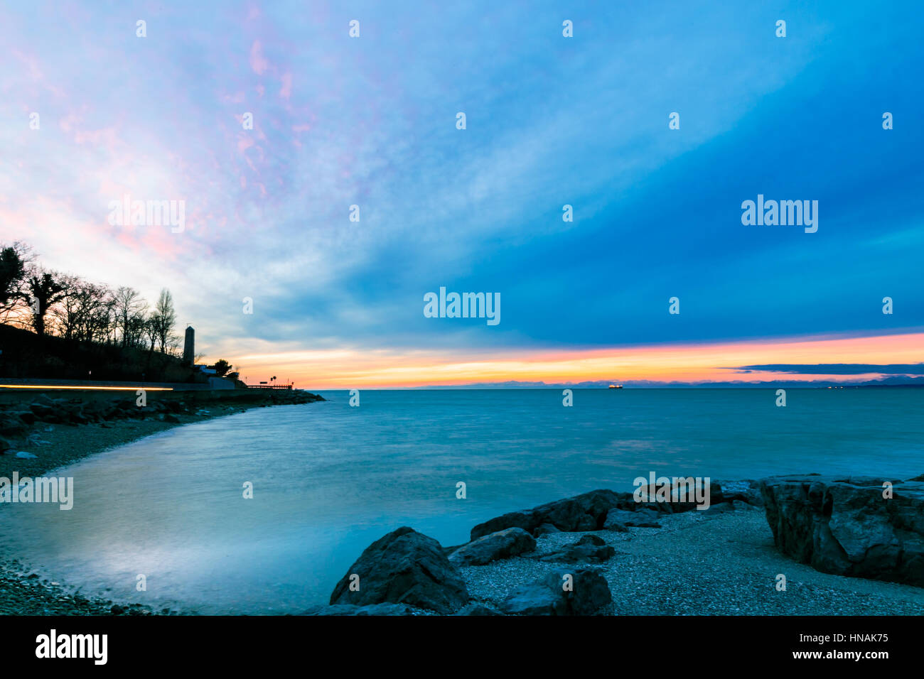 Winter evening from the shore of Muggia, Trieste Gulf Stock Photo - Alamy