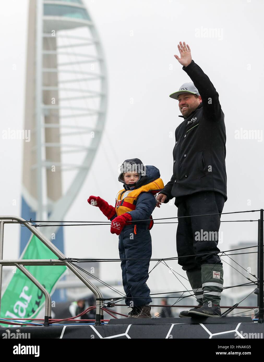 British sailor Alex Thomson, with his son Oscar, as they take part in a ...