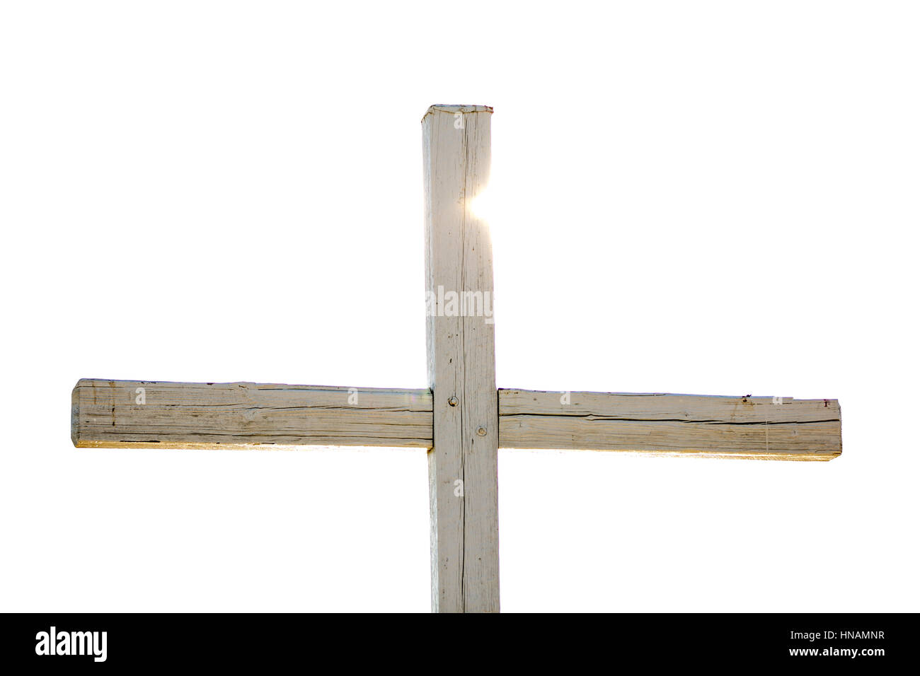 A wooden cross with sunlight shining behind it Stock Photo - Alamy