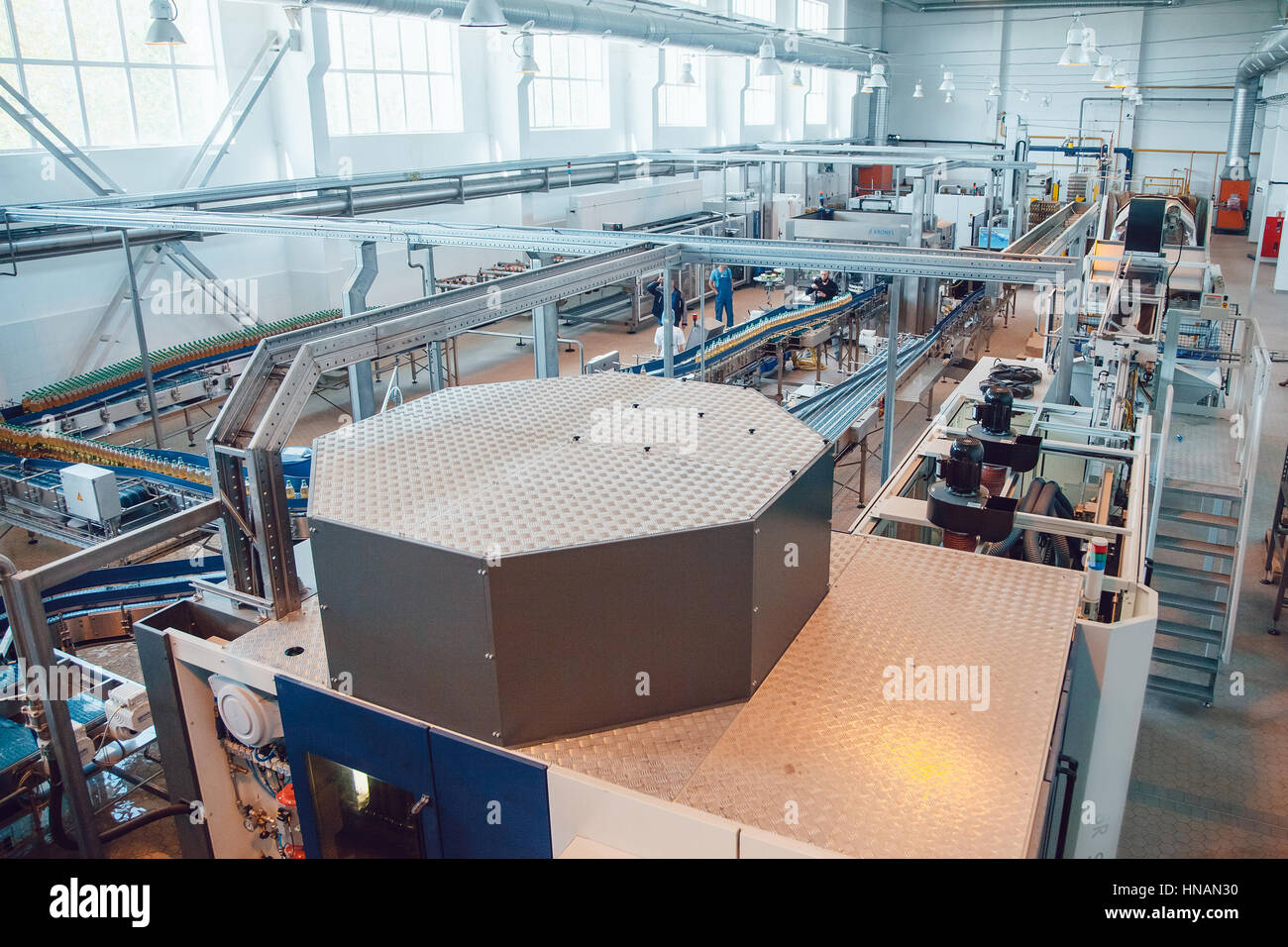 Modern beer plant, with brewing kettles, vessels, tubs and pipes made ...