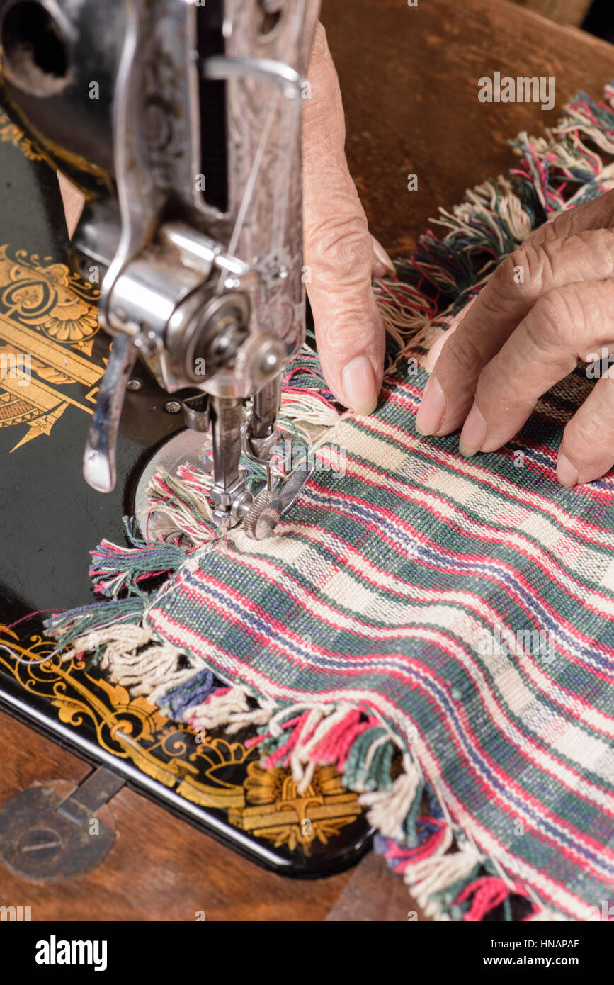 Tailor working on a sewing machine Stock Photo - Alamy