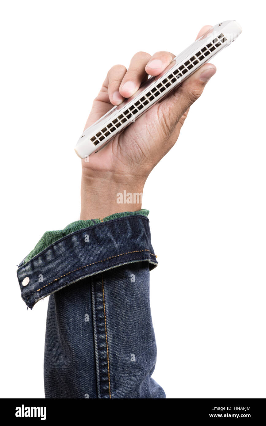 isolate harmonica in musician hand Stock Photo - Alamy
