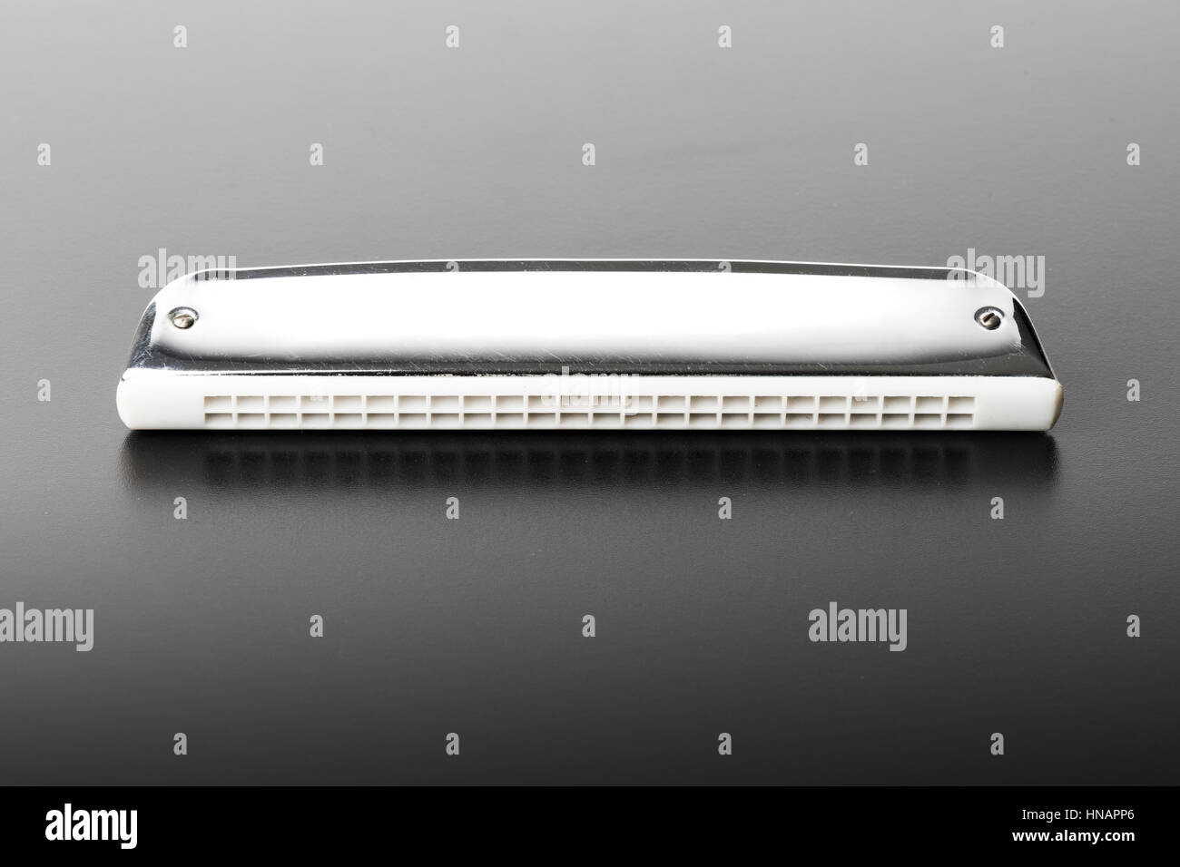 isolate harmonica on black background Stock Photo - Alamy