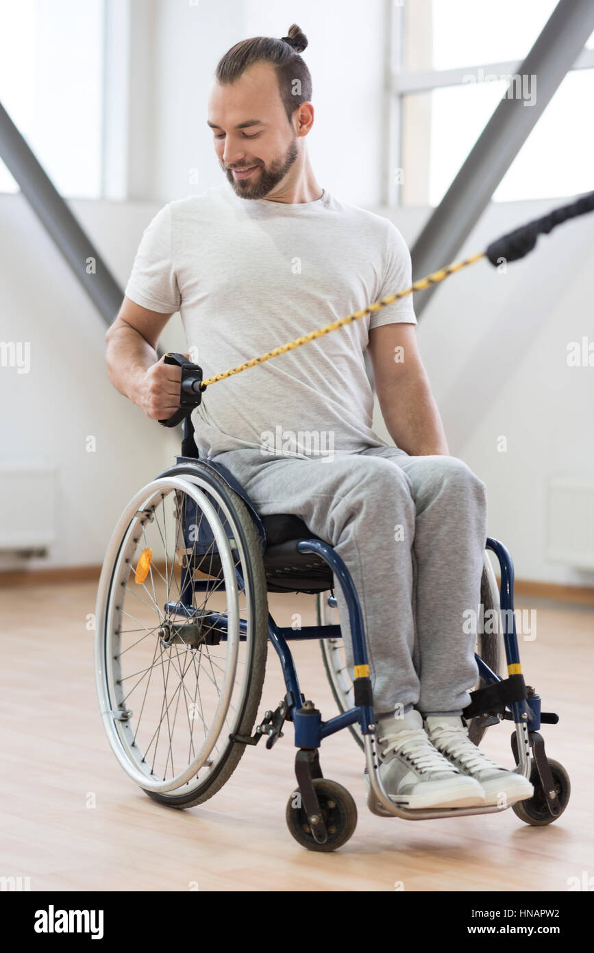 Friendly young disabled working out in the gym Stock Photo - Alamy