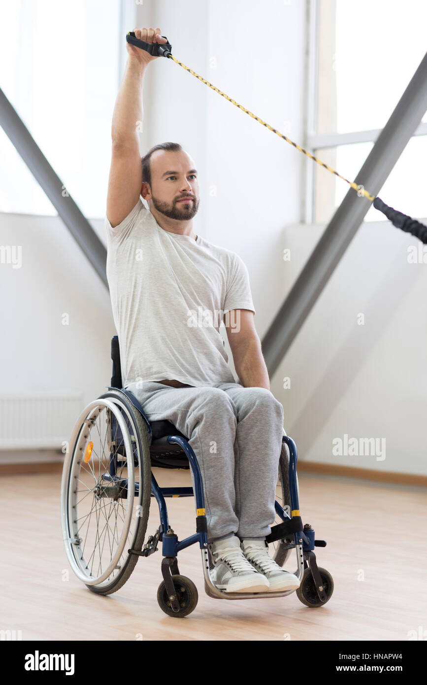Confident young disabled working out in the gym Stock Photo - Alamy
