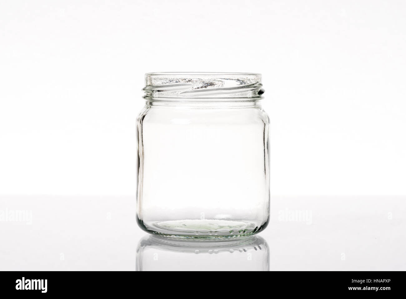 clear glass jar isolated on white background Stock Photo - Alamy