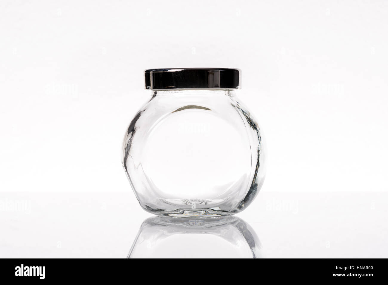clear glass jar isolated on white background Stock Photo - Alamy