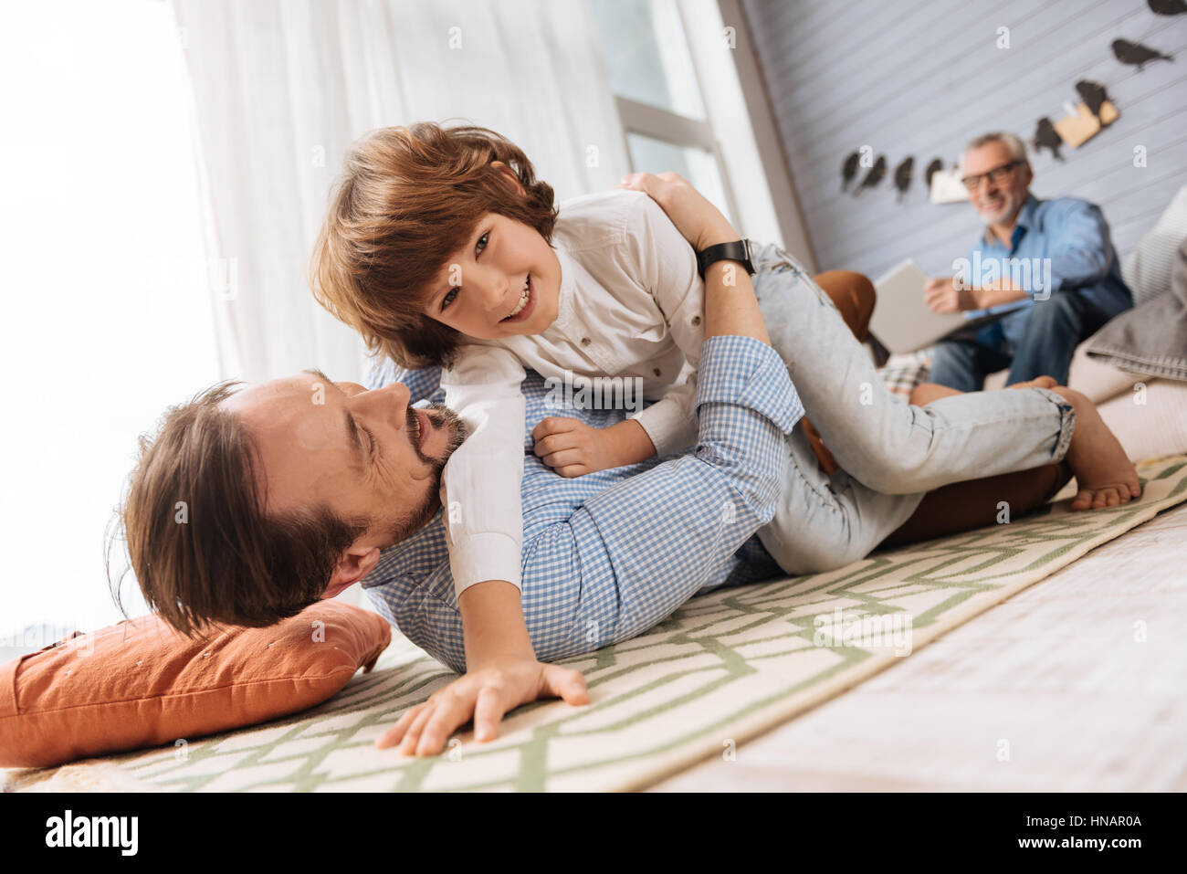 Cute happy boy spending time with his father Stock Photo - Alamy