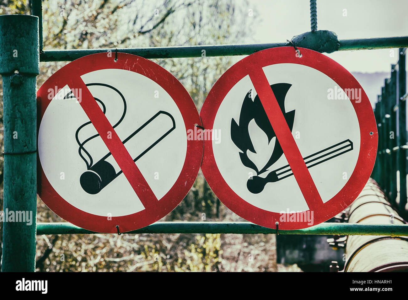 Flammable material warning signs. No smoke, no fire. Vintage toned ...