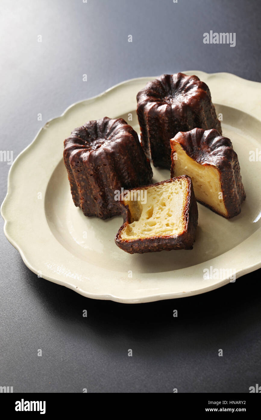 cannele de bordeaux, french traditional custard dessert Stock Photo - Alamy