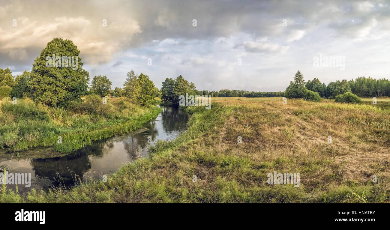 Lush green valley river flowing hi-res stock photography and images - Alamy
