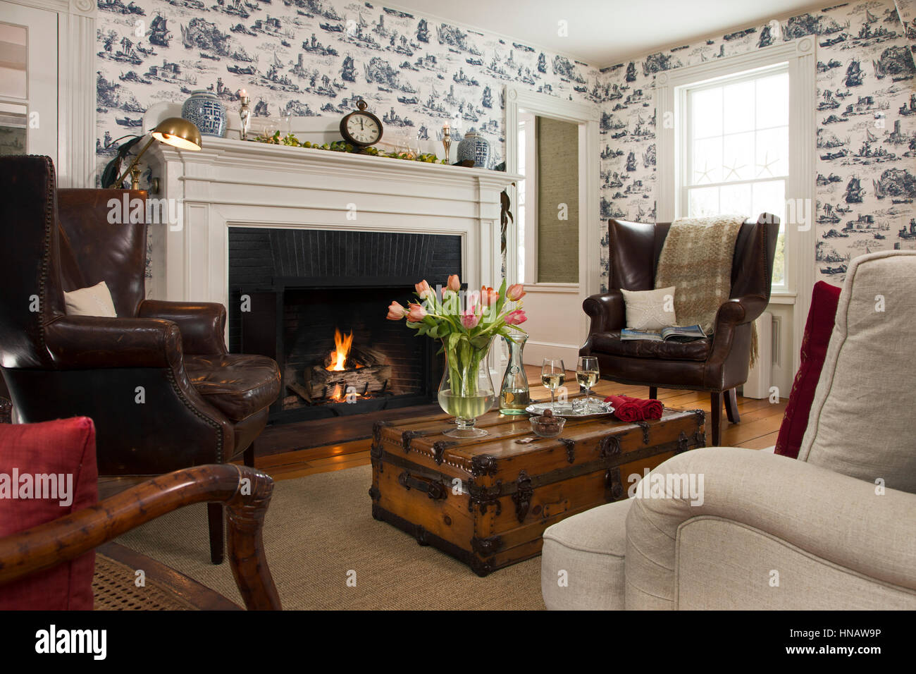 Interior detail of Cape Cod living room with fireplace, Chatham Gables ...