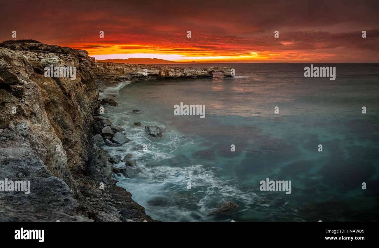 Beautiful natural big rock arch at sunset near Rethimno, Crete Stock ...