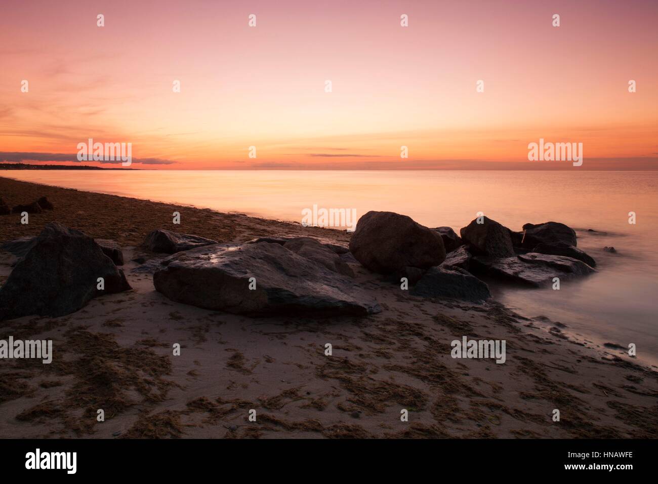 Sunset on the bay in Cape Cod, Brewster, MA Stock Photo - Alamy