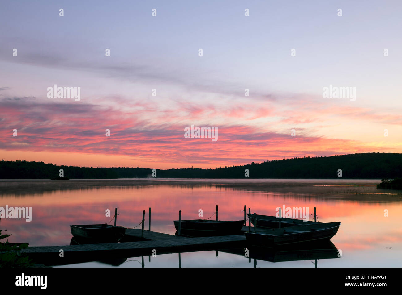 Row boats dock sunset hi-res stock photography and images - Alamy