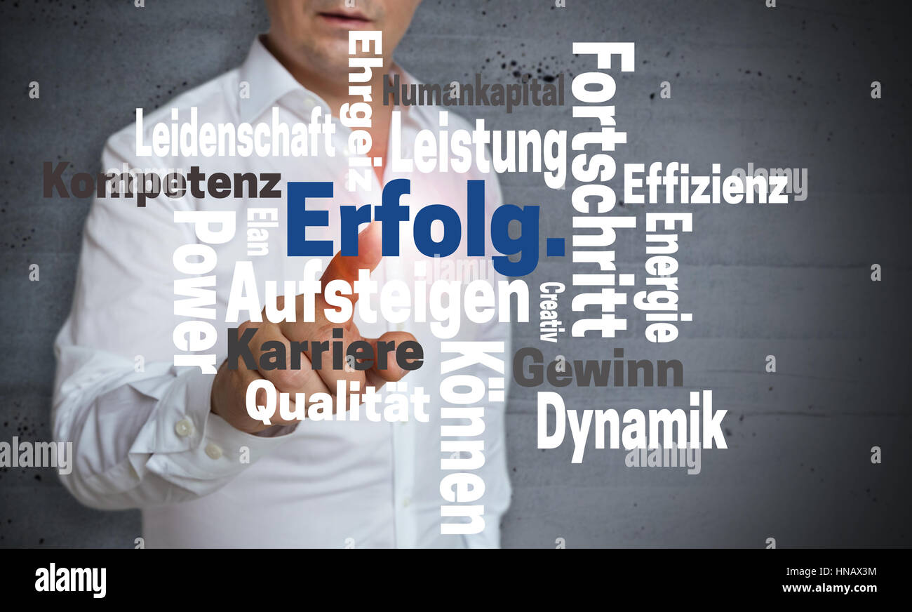 Erfolg (in german Success) Wordcloud touchscreen is operated by man ...