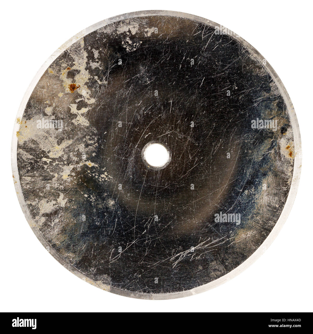 Old grungy scratched metal disk isolated on white background Stock ...