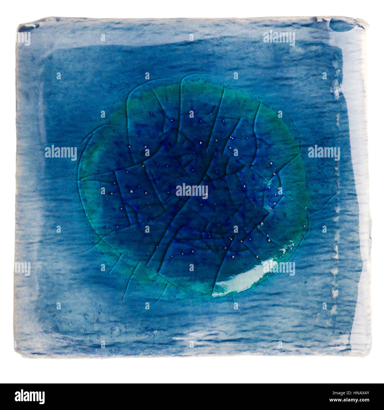 Blue handmade glazed ceramic tile with bubble in middle isolated on ...
