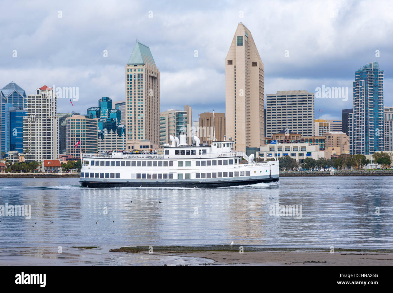 A harbor excursion boat on San Diego Harbor with the San Diego Skyline ...
