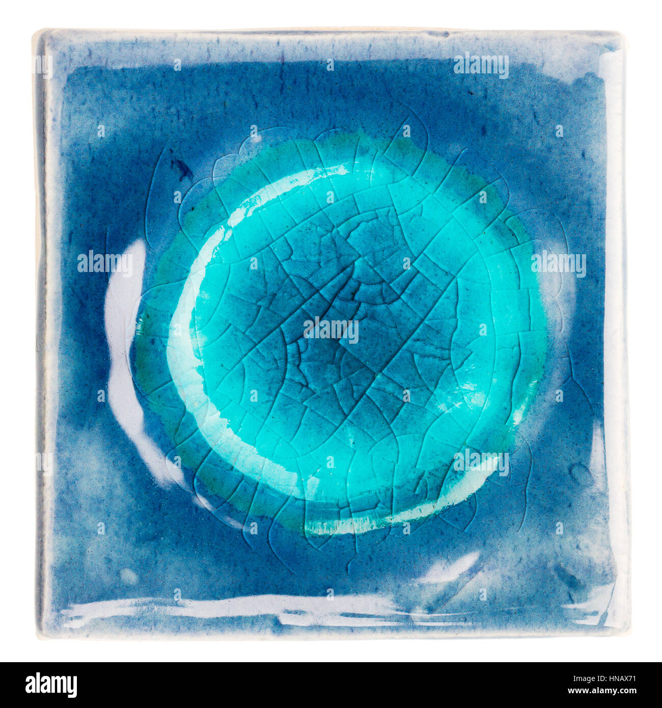 Blue handmade glazed ceramic tile with bubble in middle isolated on ...