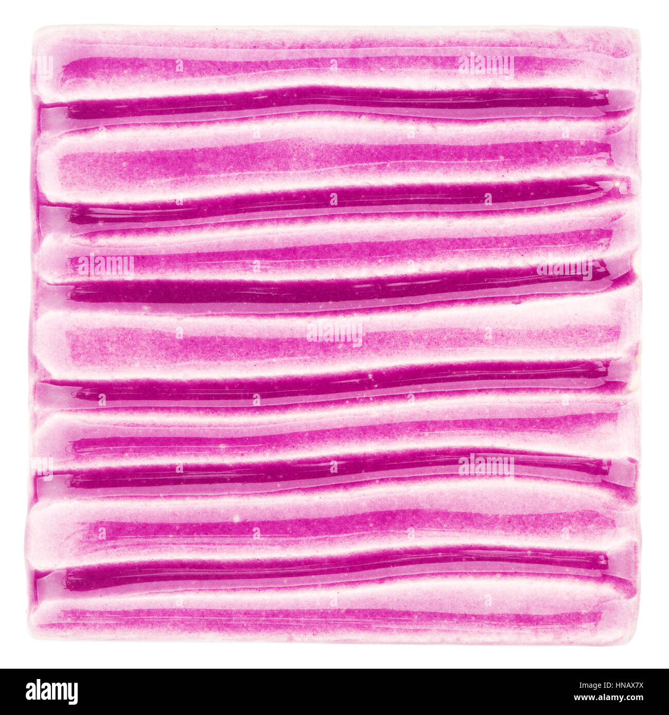 Purple lined handmade glazed ceramic tile isolated on white background ...